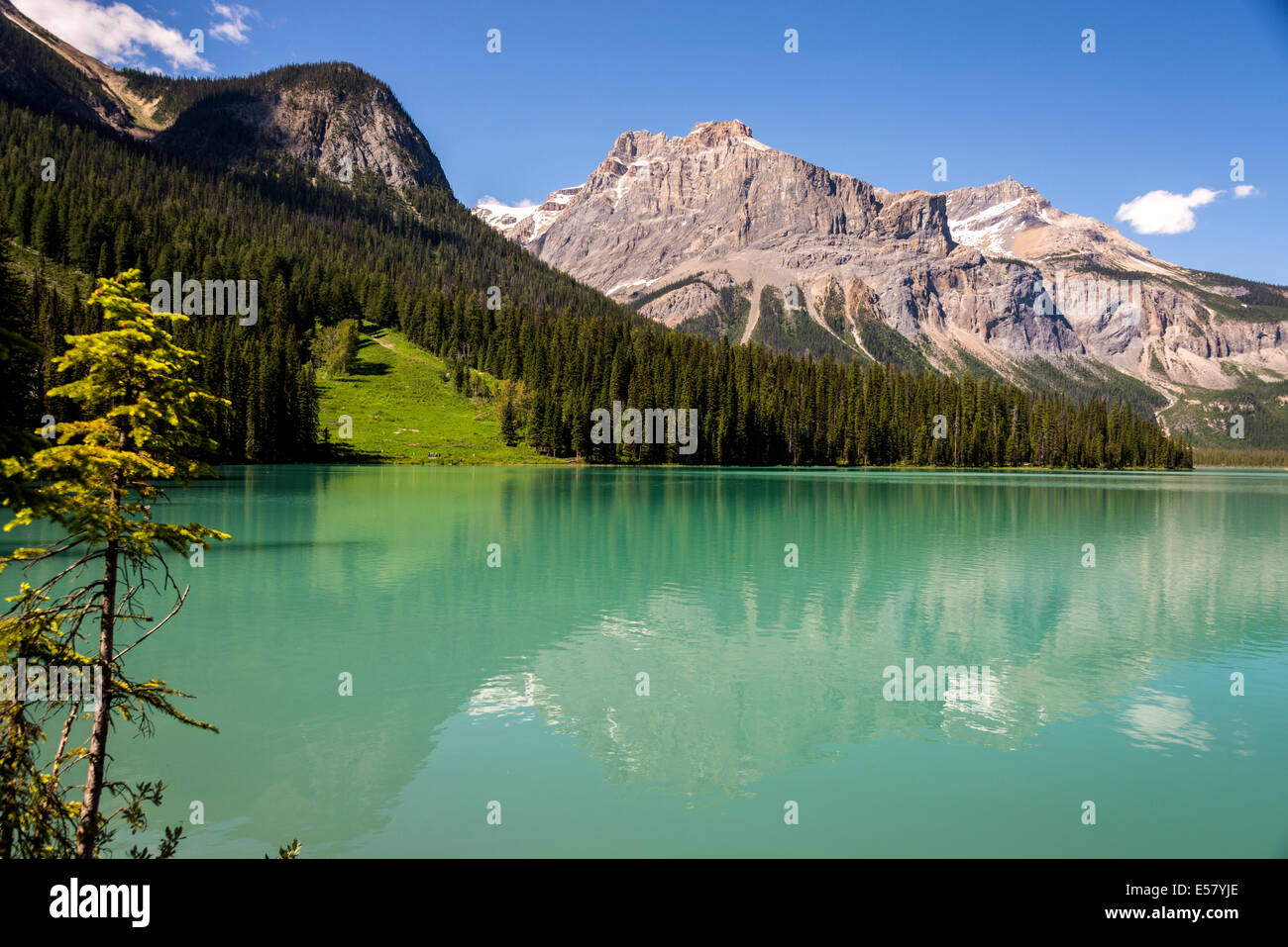 Emerald Lake with Mountains Stock Photo - Alamy