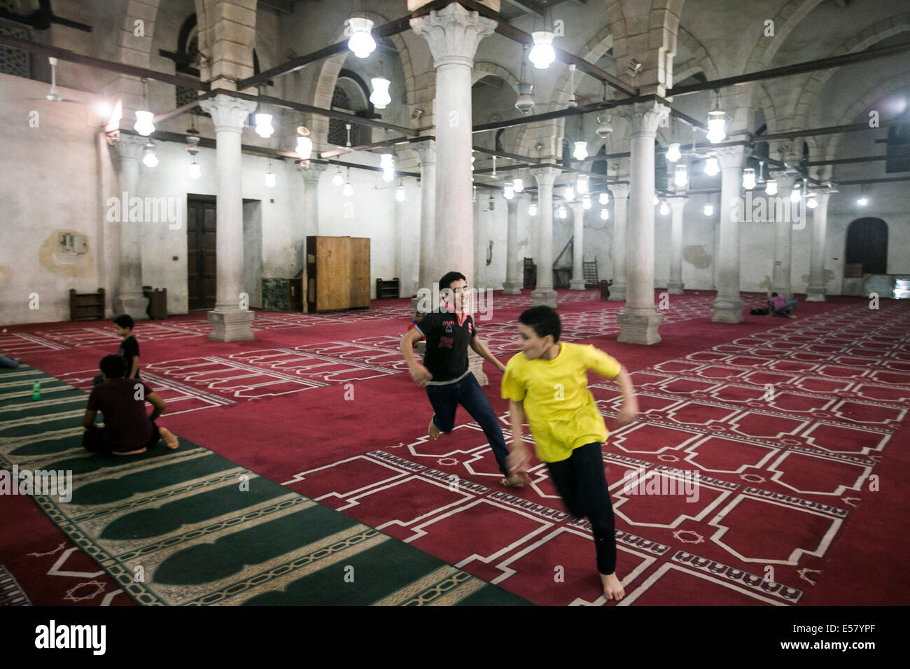 Cairo. 29th June, 2014. Egyptian boys have fun inside a mosque during ...