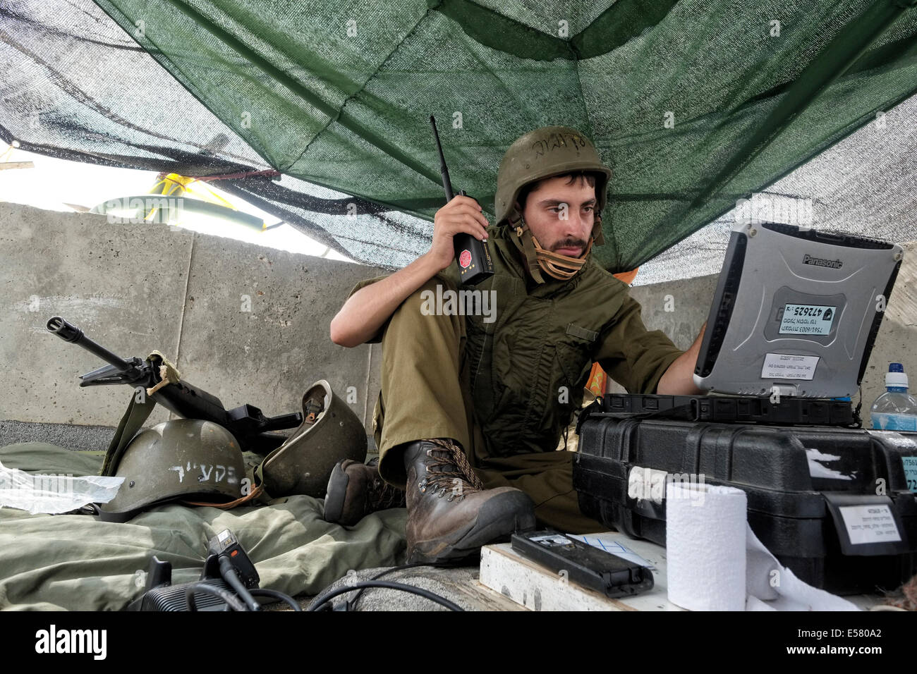 An Israeli soldier from the Field Intelligence Corps using a computer ...