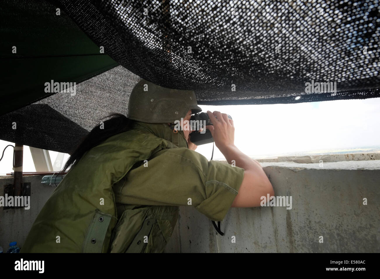 An Israeli soldier from the Field Intelligence Corps scans Beersheba ...
