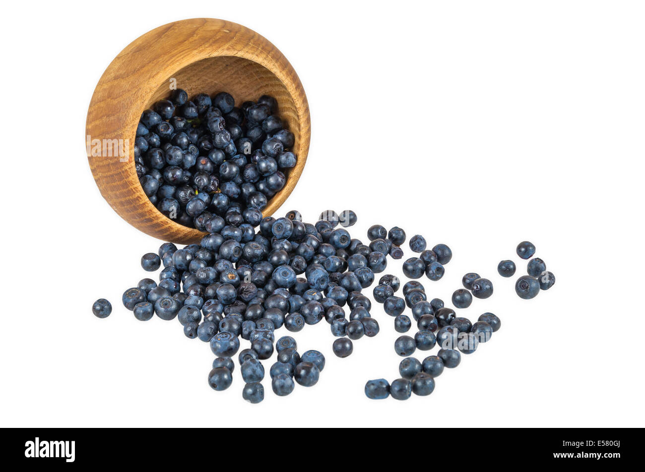 Berries fall out of the bowl isolated on white background with clipping ...