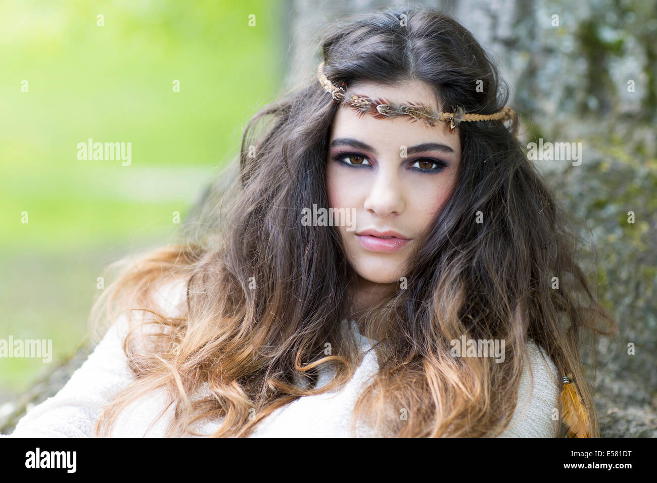 Young woman with a headband, portrait Stock Photo - Alamy