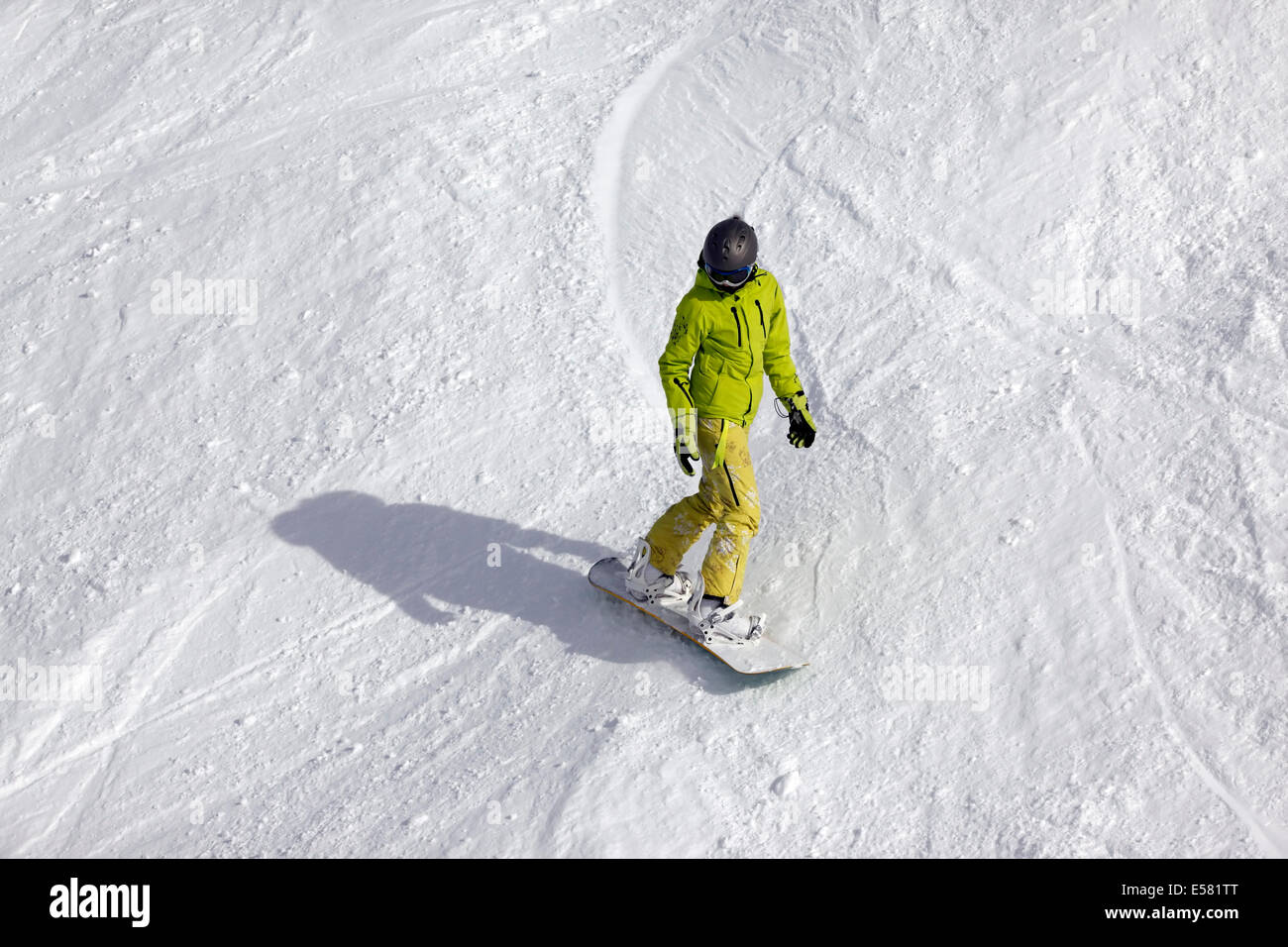 Snowboarder riding fresh powder snow Stock Photo - Alamy