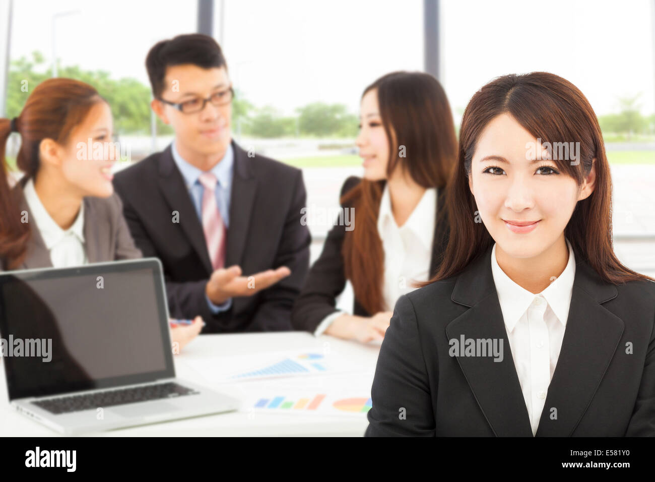 business female manager with teams in the office Stock Photo - Alamy