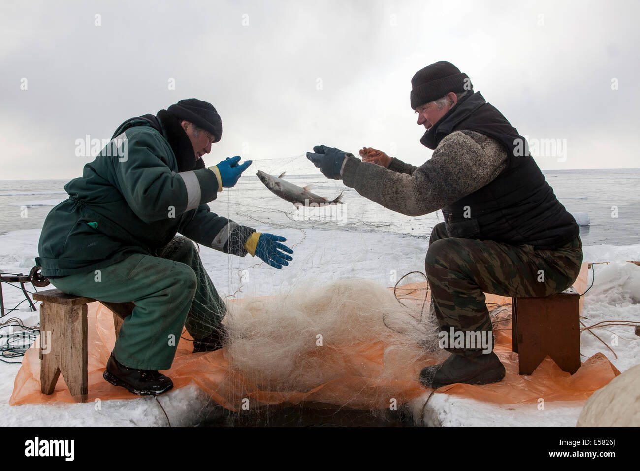 Lake baikal winter ice fishing hi-res stock photography and images - Alamy