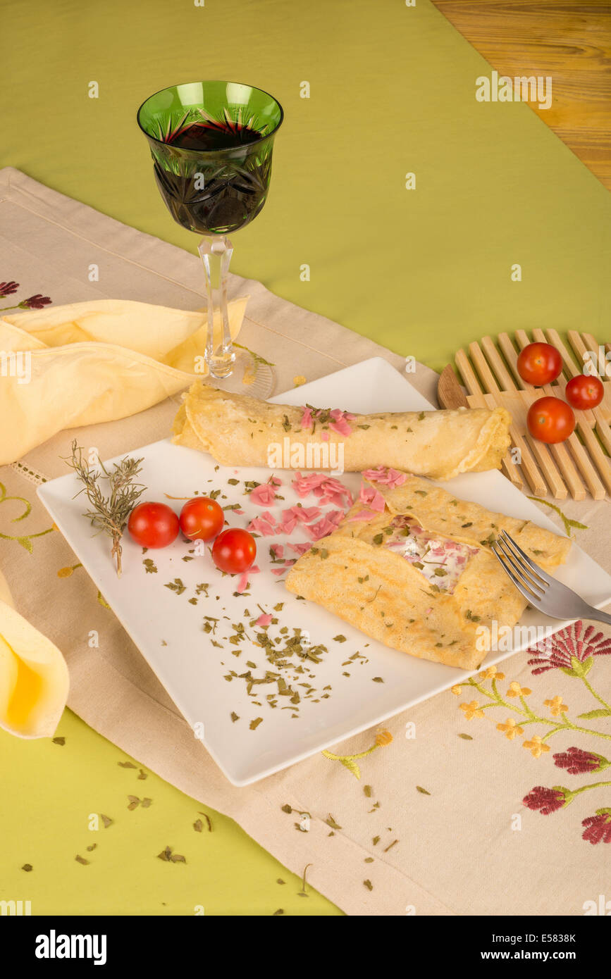 Folded crepe stuffed with fresh ham and cheese Stock Photo - Alamy