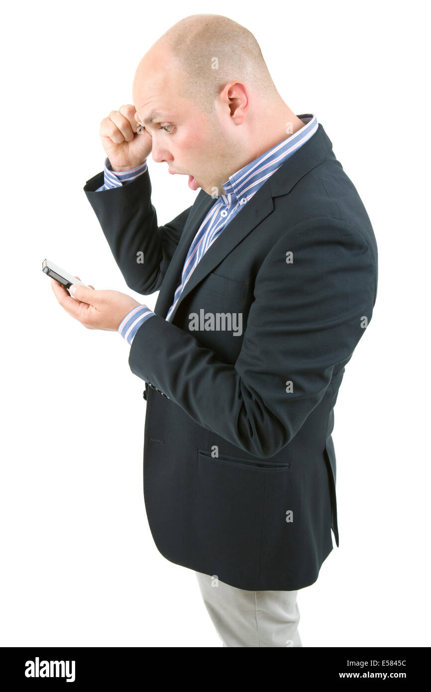 young casual man mad and surprised at the phone, isolated Stock Photo ...
