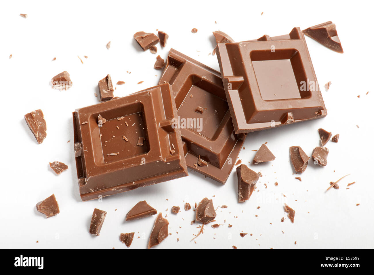 chocolate blocks with pieces, on white background Stock Photo - Alamy