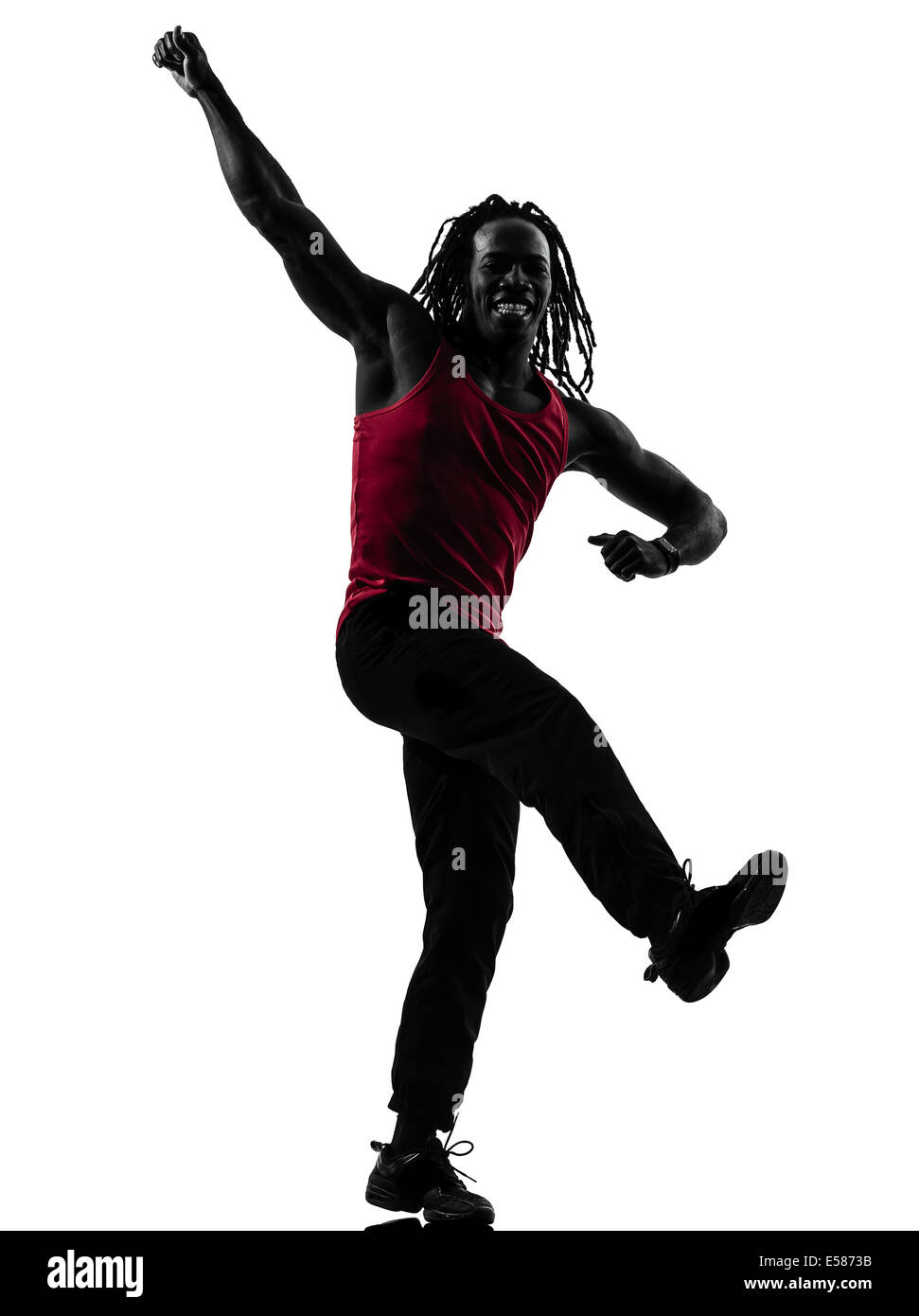 one african man exercising fitness zumba dancing in silhouette on white ...
