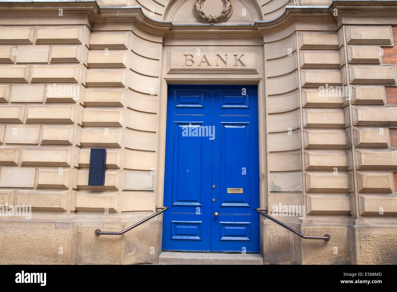 Bank Entrance on Yellow Stone Background Stock Photo - Alamy