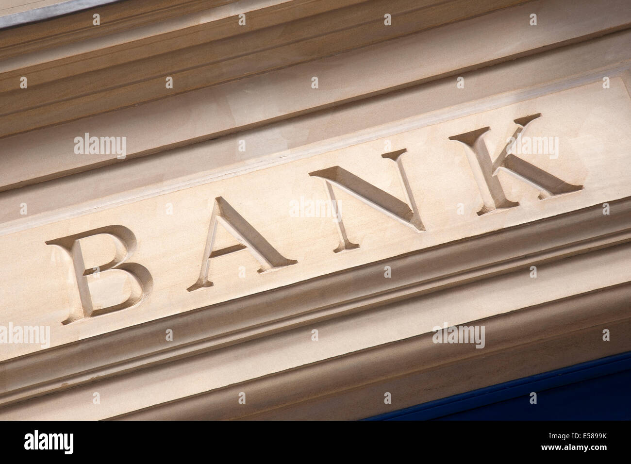 Bank Sign on Yellow Stone Background in Diagonal Slant Stock Photo - Alamy