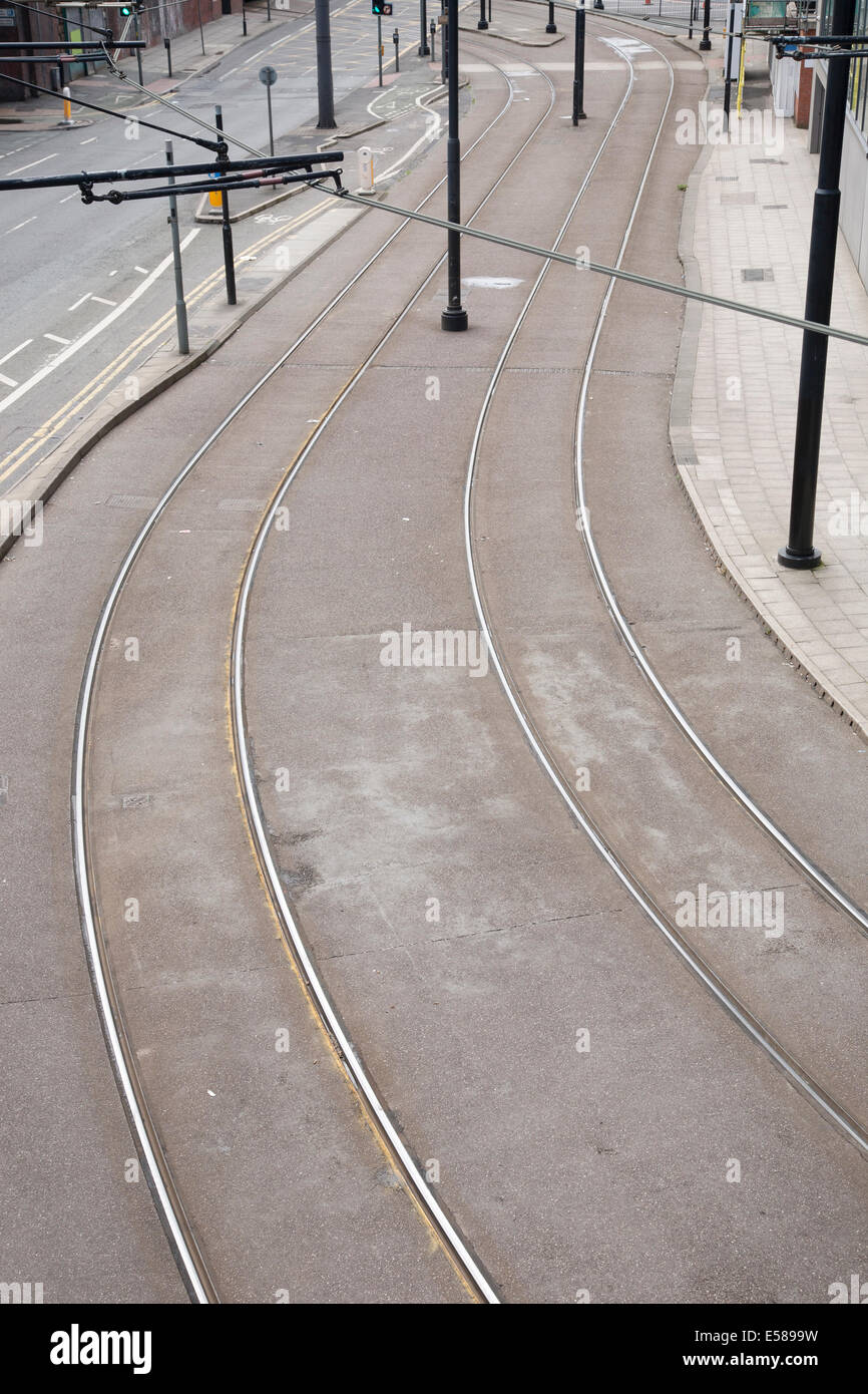 Urban Scene with Tram Lines on Street Stock Photo - Alamy