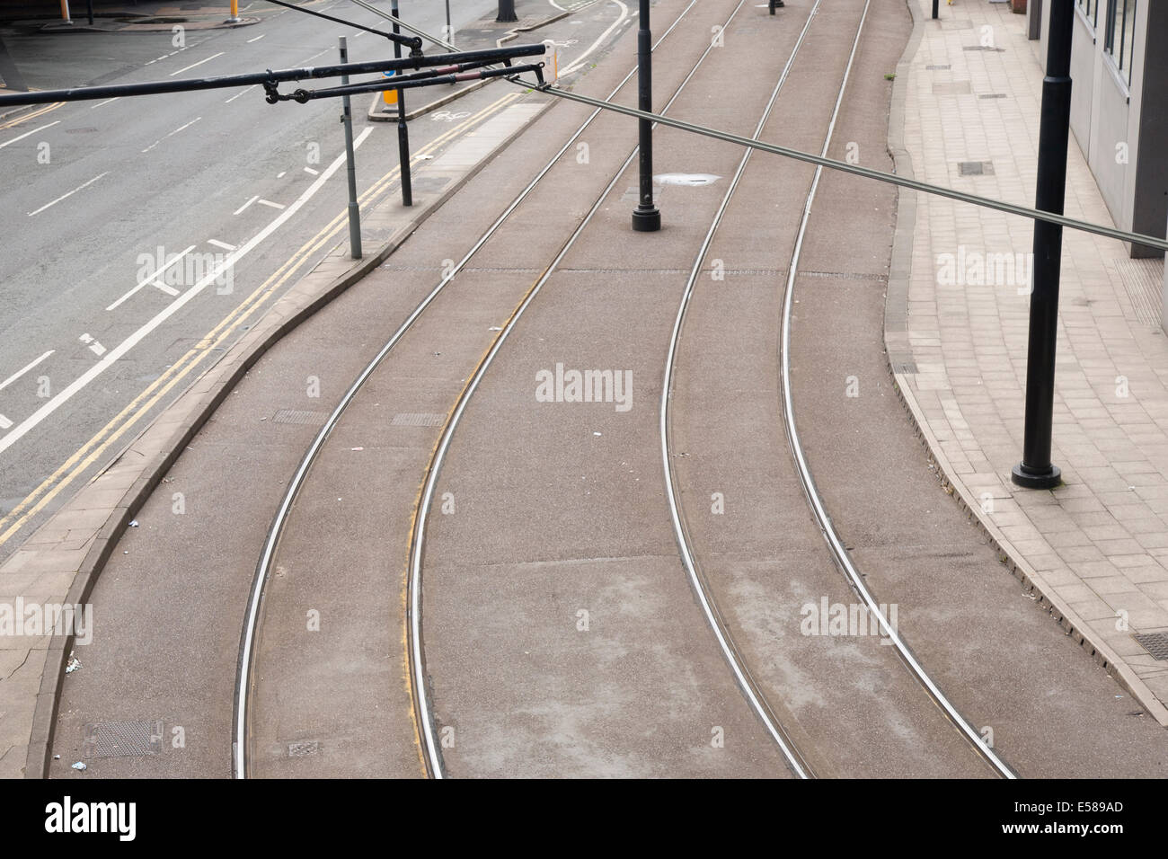 Urban Scene with Tram Lines on Street Stock Photo - Alamy