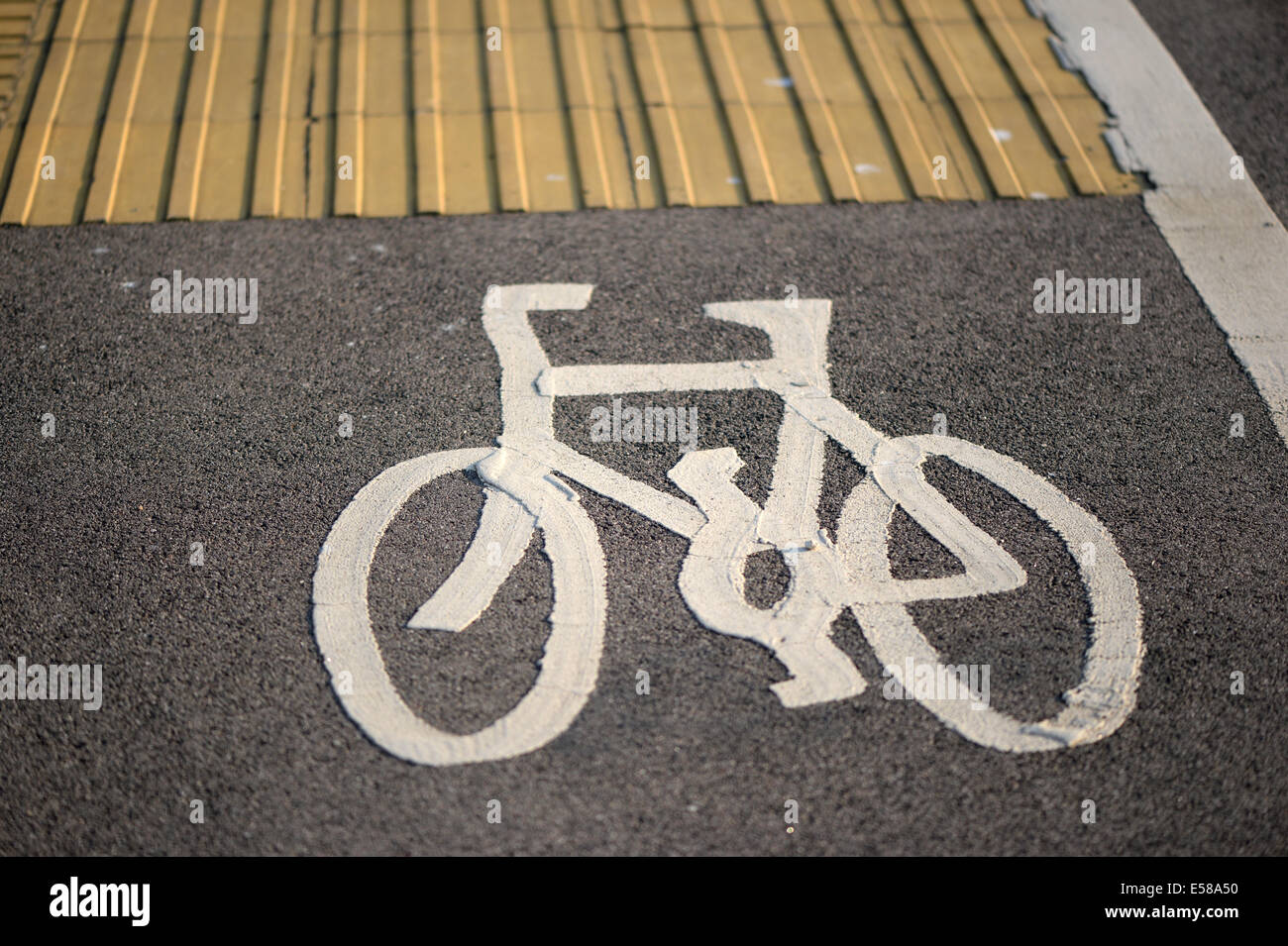 Painted cycle route sign on pavement uk Stock Photo - Alamy