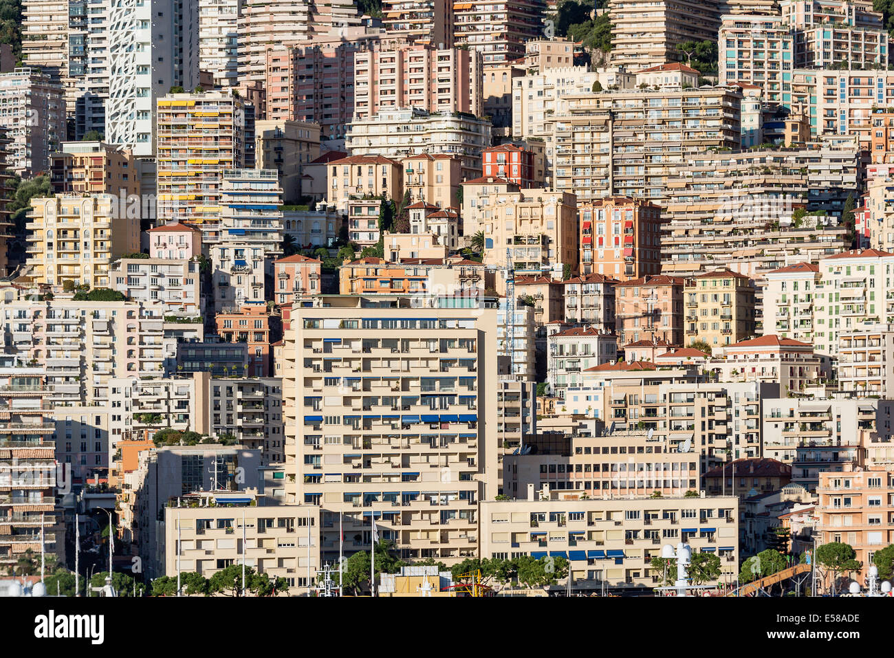 Dense cluster of city buildings at night Stock Photo - Alamy