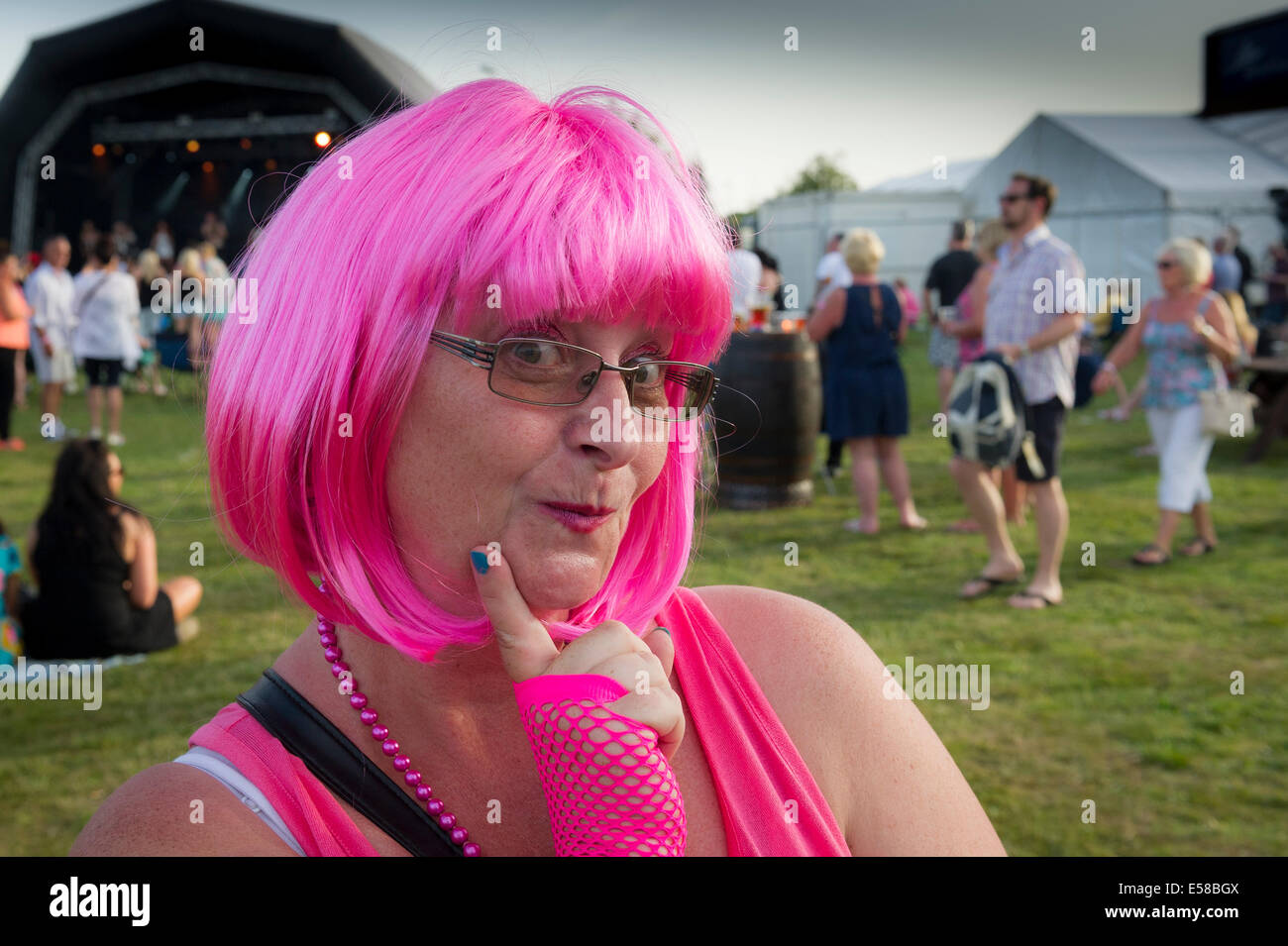 Wearing pink wig hi-res stock photography and images - Alamy