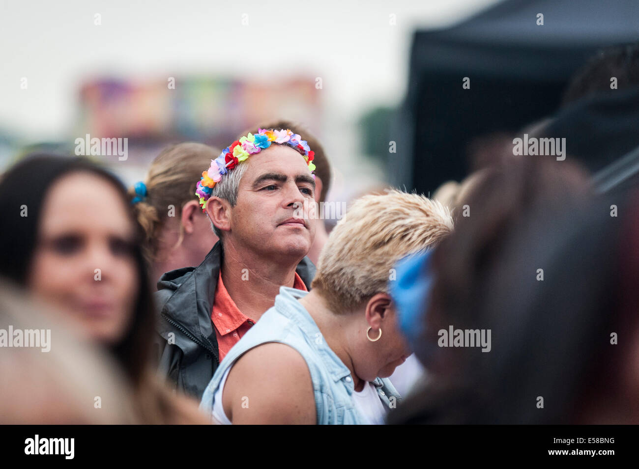 Man wearing garland flowers around hi-res stock photography and images ...