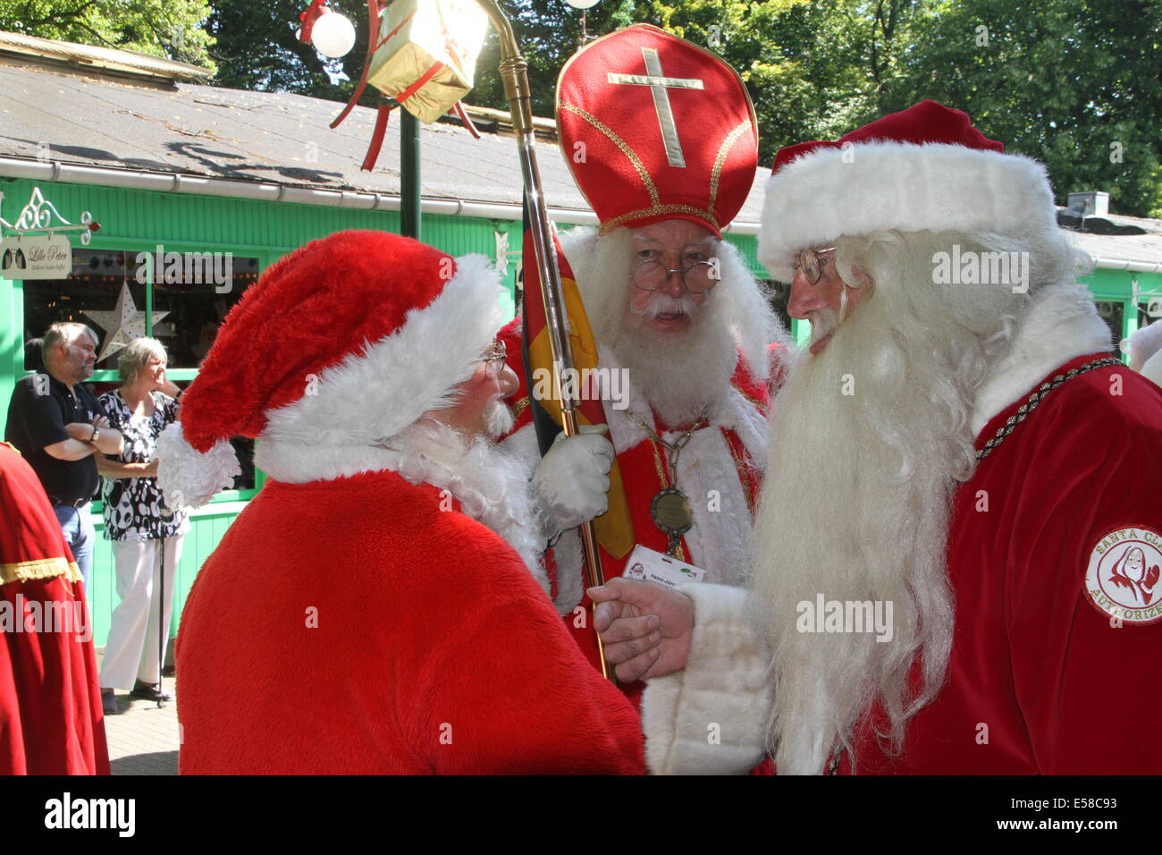 Three Santas High Resolution Stock Photography and Images - Alamy