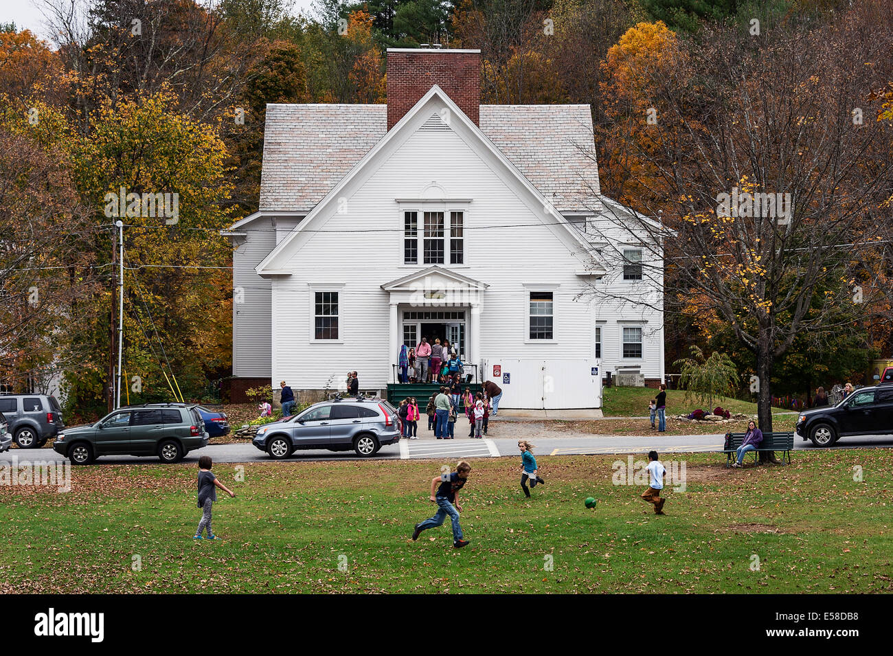 School letting out at an old fashioned school house, Townshend, Vermont ...