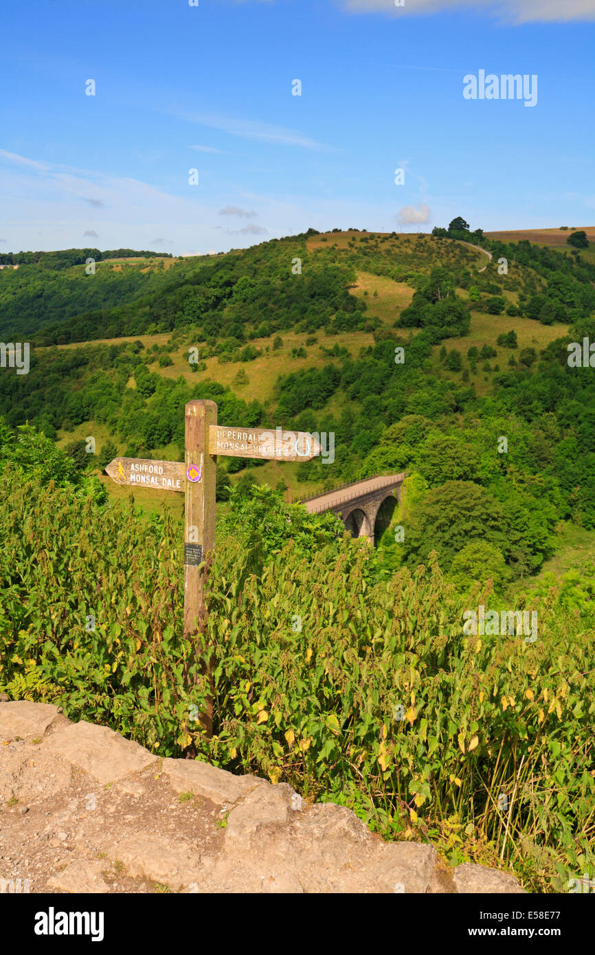 Headstone Viaduct and wooden fingerpost at Monsal Head looking in to ...