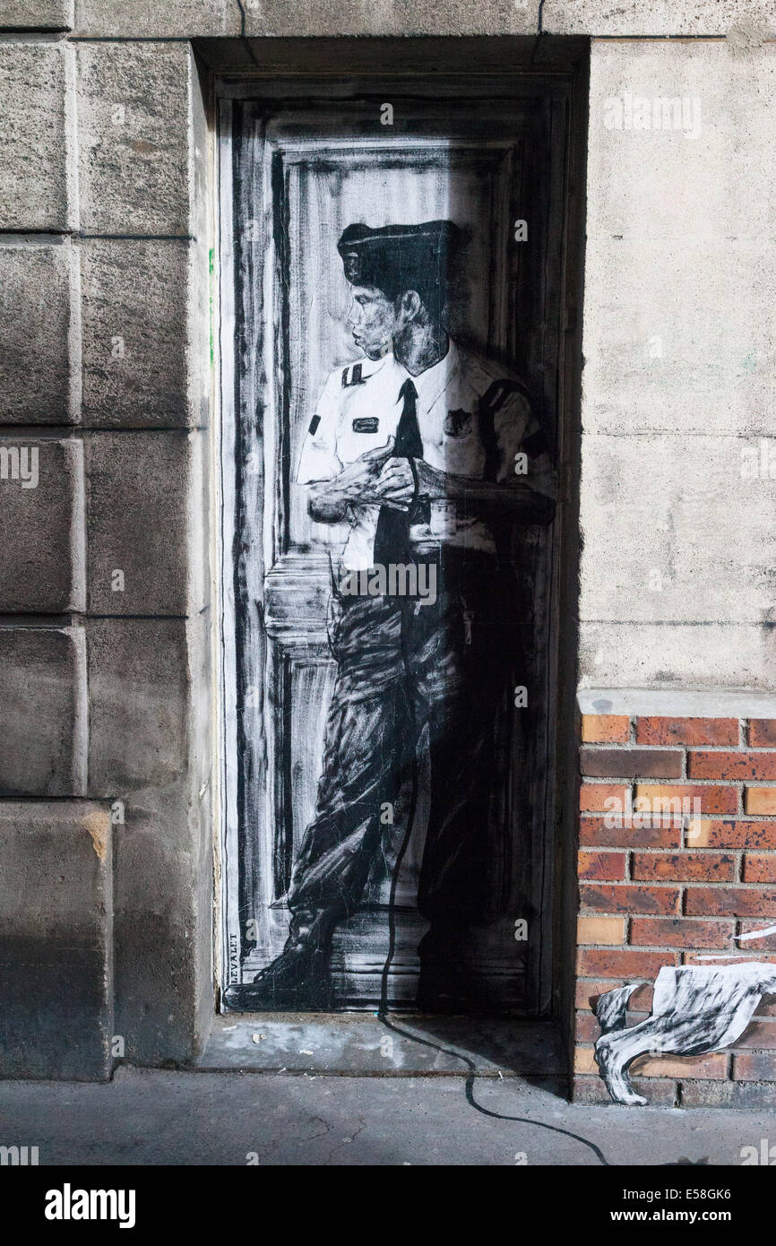 2014. Paris. Graffiti representing a soldier. Street art Stock Photo ...