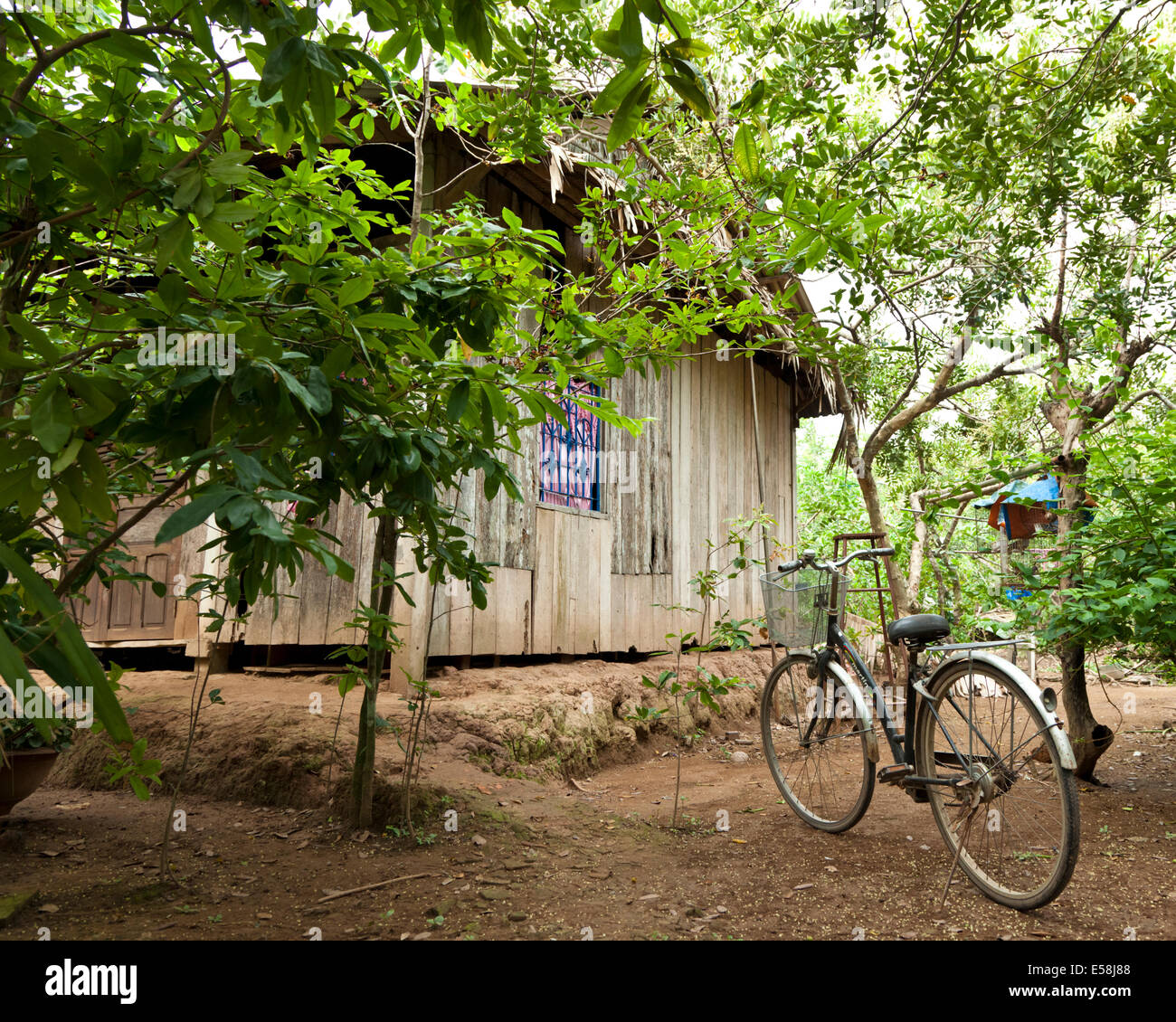 House with bicycle hi-res stock photography and images - Alamy