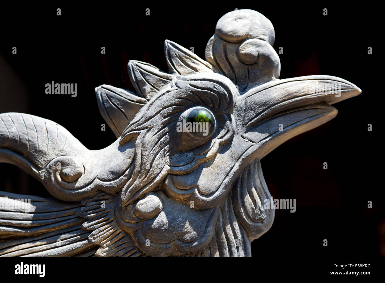 Stone bird statue at Phuc Kien Assembly Hall in Hoi An Stock Photo - Alamy