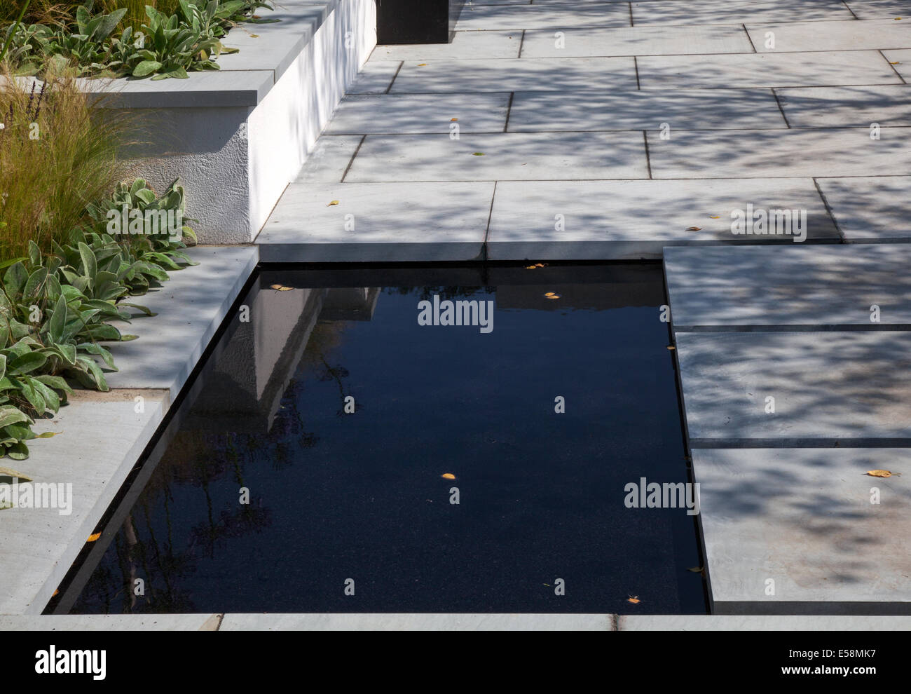 Shallow pond water feature & hard landscaping in show garden Tatton ...