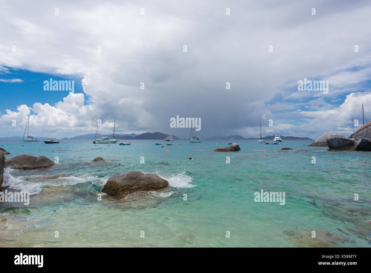 Rain storm over water on the Caribbean Island of Virgin Gorda in the ...