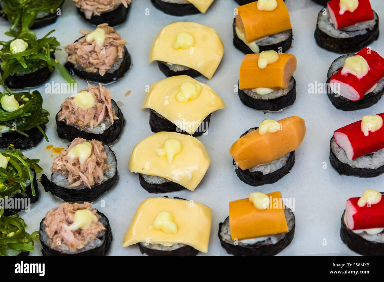 Sushi is a Japanese food consisting of cooked vinegared rice combined ...