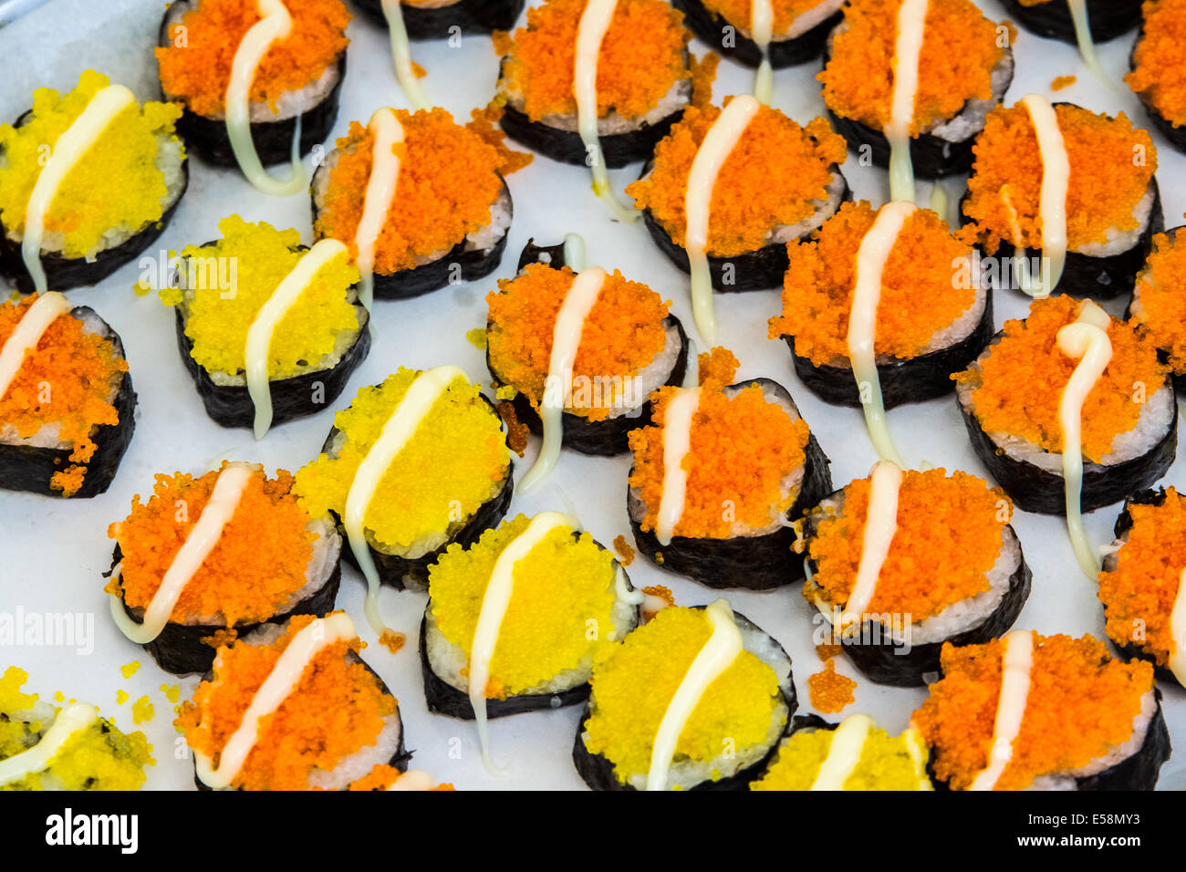 Sushi is a Japanese food consisting of cooked vinegared rice combined ...