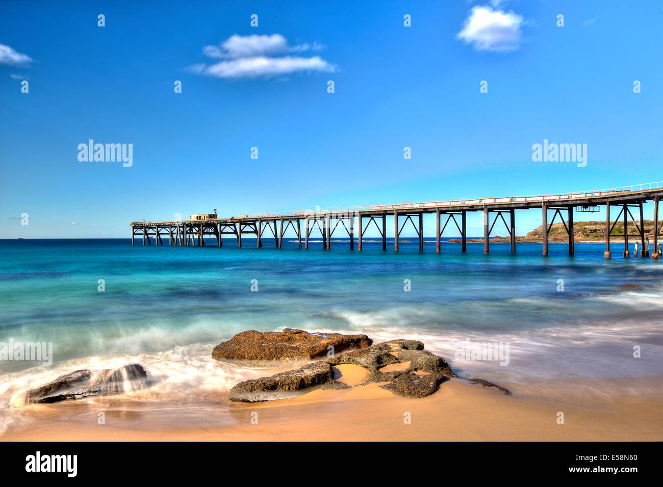 Jetty over the ocean Stock Photo - Alamy