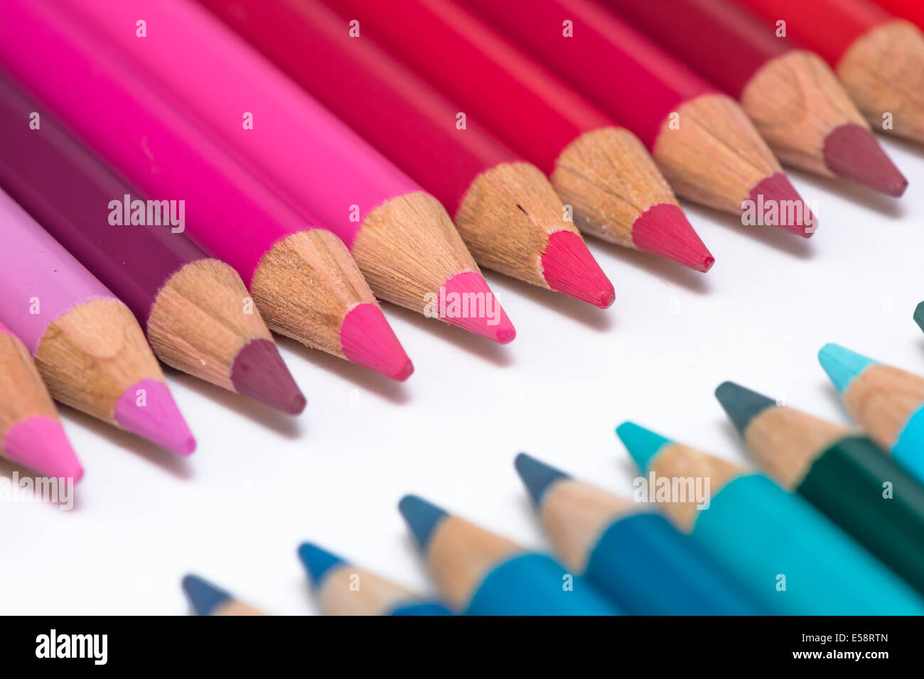 Two Isolated Opposite Rows Of Colorful Crayons Stock Photo - Alamy