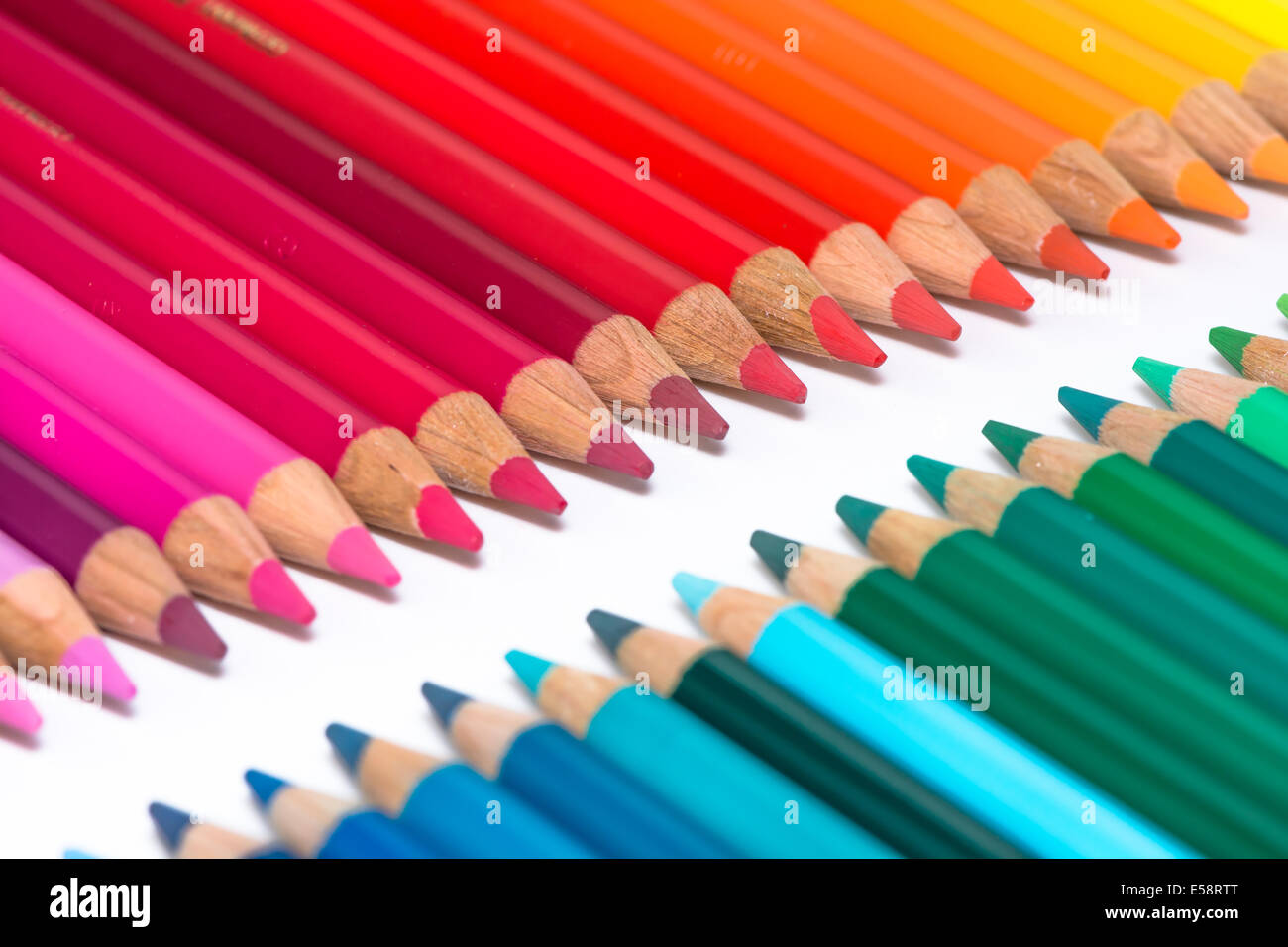 Two Isolated Opposite Rows Of Colorful Crayons Stock Photo - Alamy