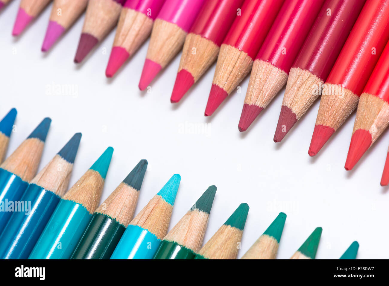 Two Isolated Opposite Rows Of Colorful Crayons Stock Photo - Alamy