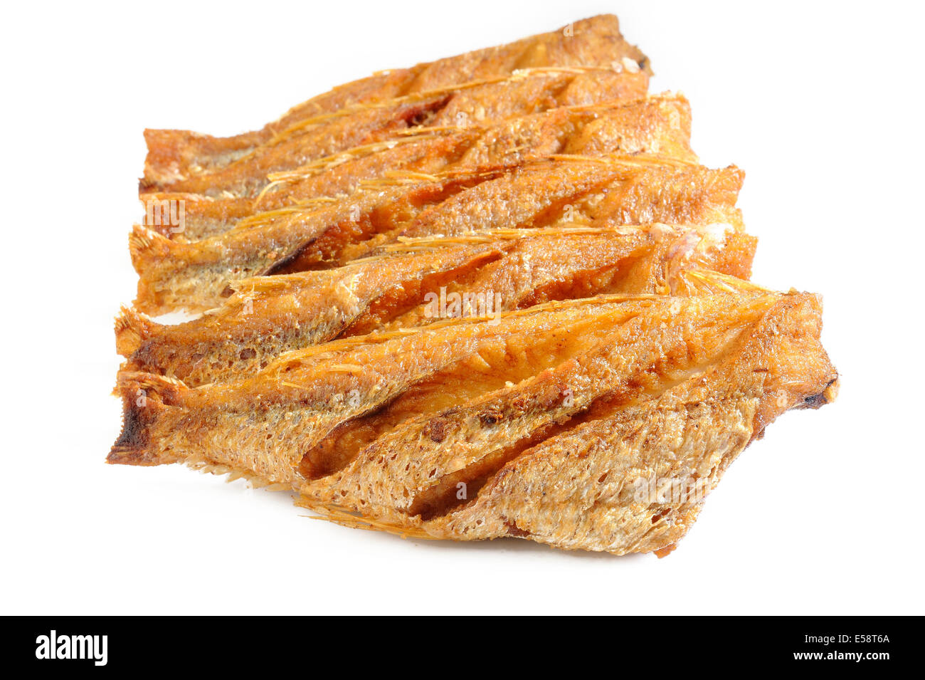 fried fish on white background Stock Photo - Alamy