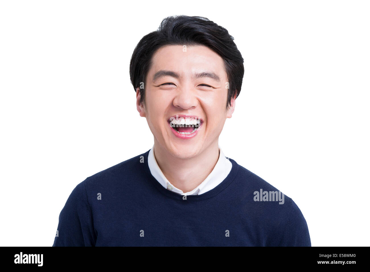 Cheerful young man laughing Stock Photo - Alamy