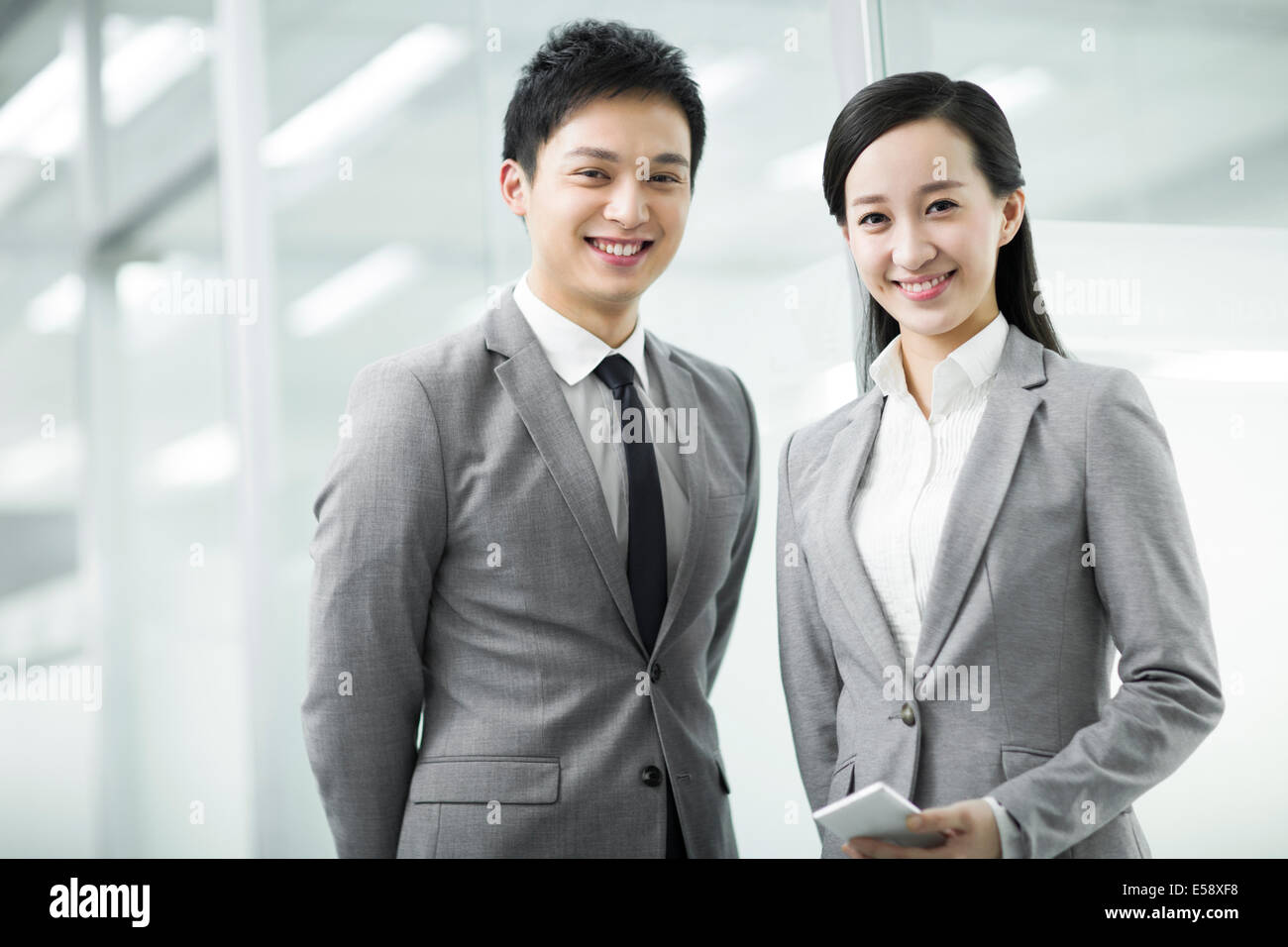 Happy asian business associates hi-res stock photography and images - Alamy