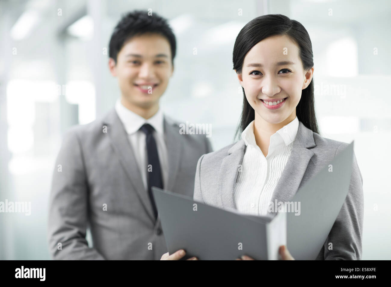 Happy business associates Stock Photo - Alamy