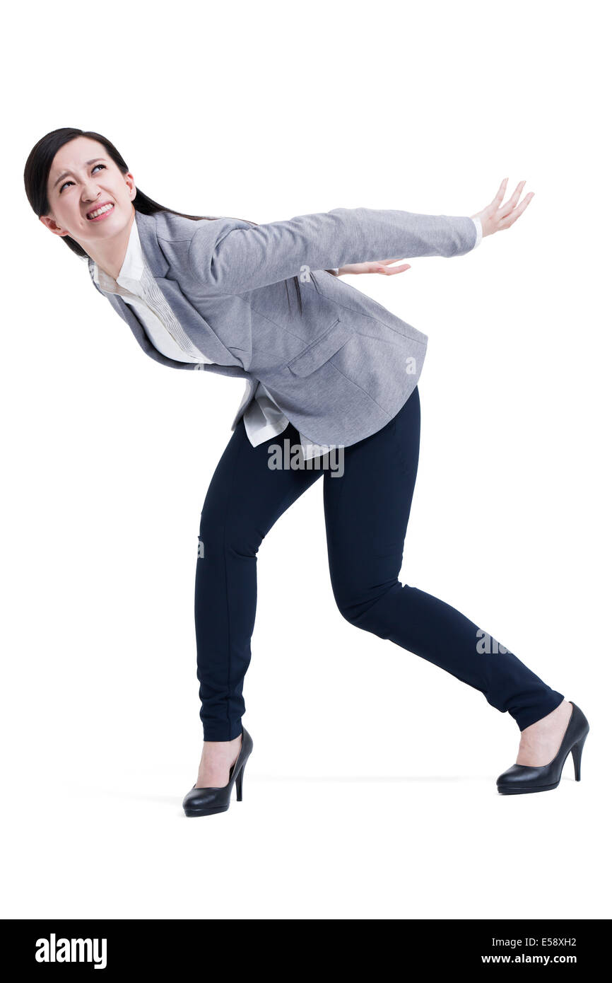 Over burdened businesswoman Stock Photo - Alamy
