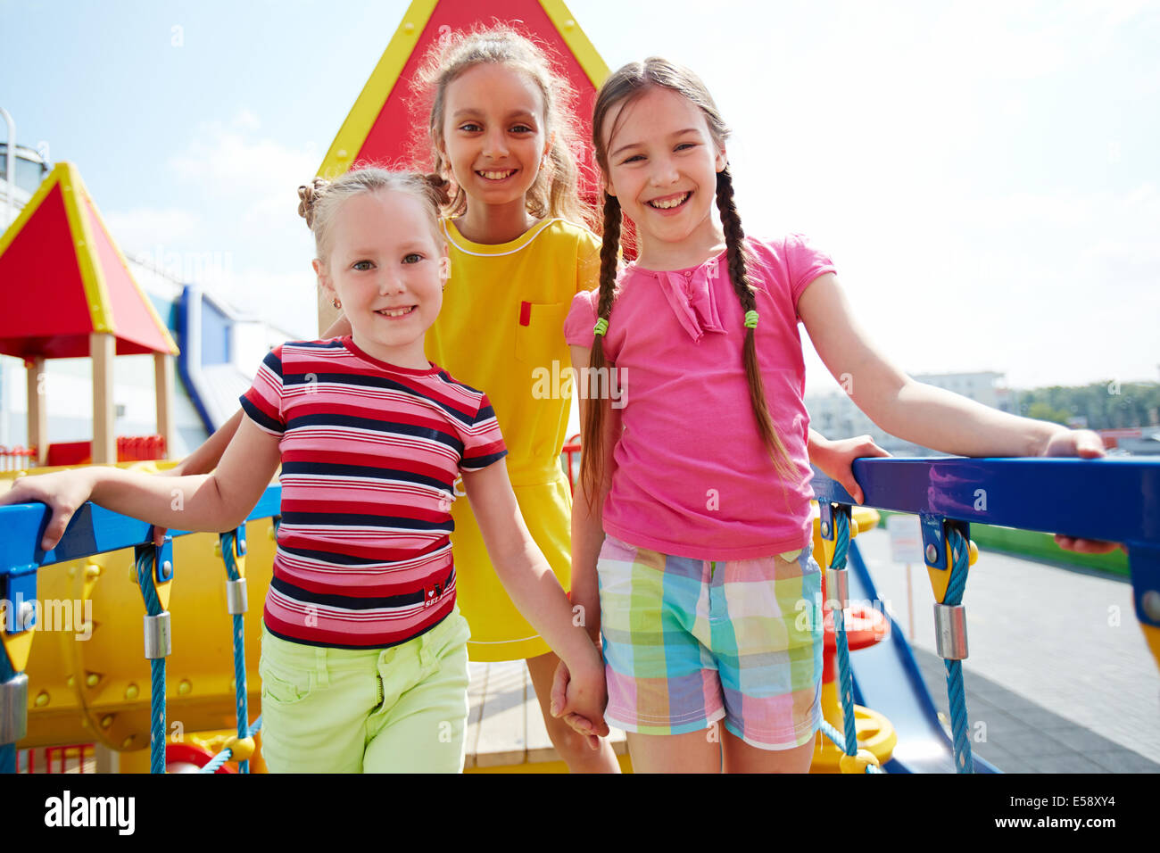 Image of cute girls spending time on playground outdoors Stock Photo ...