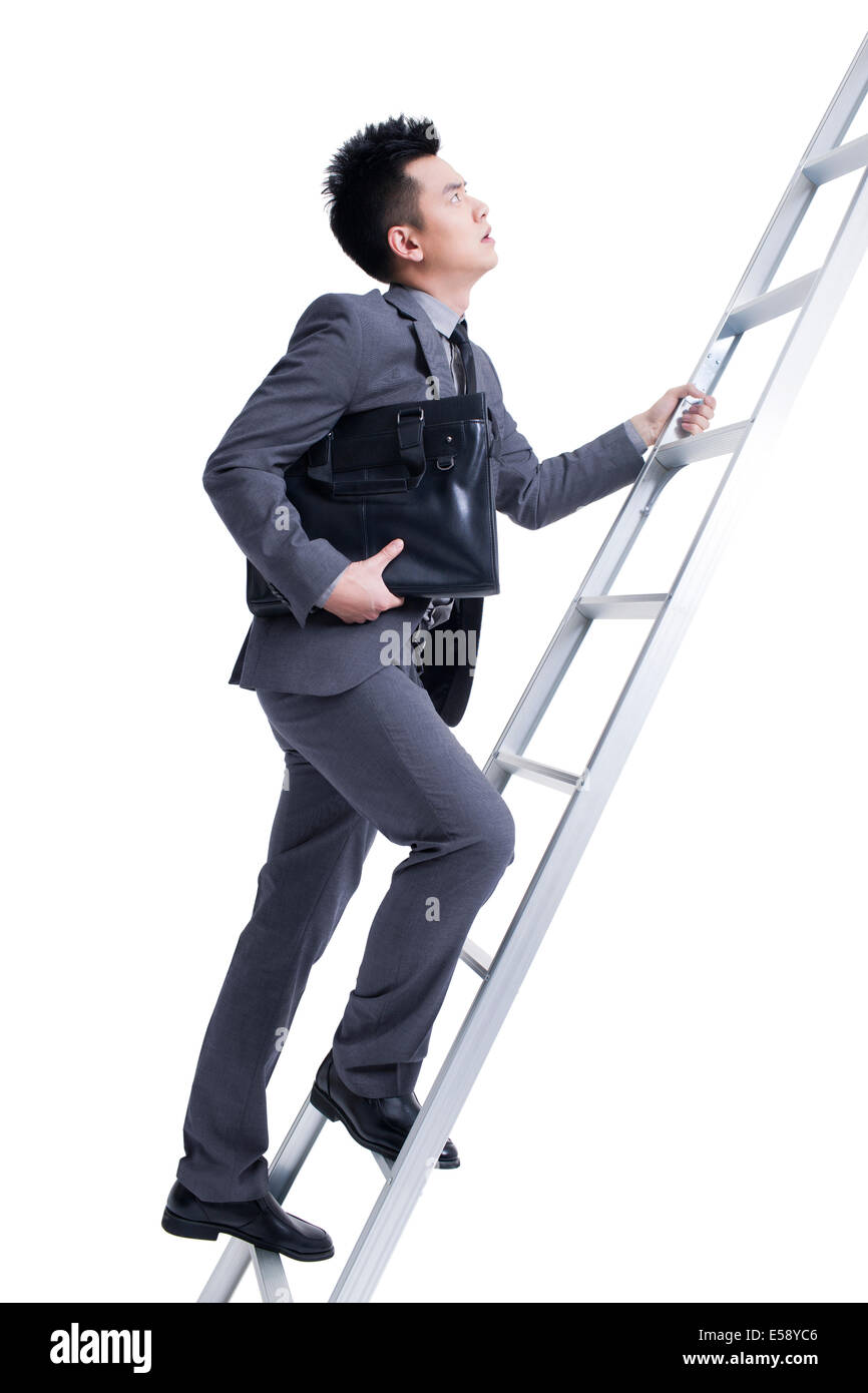 Businessman climbing ladder Stock Photo - Alamy