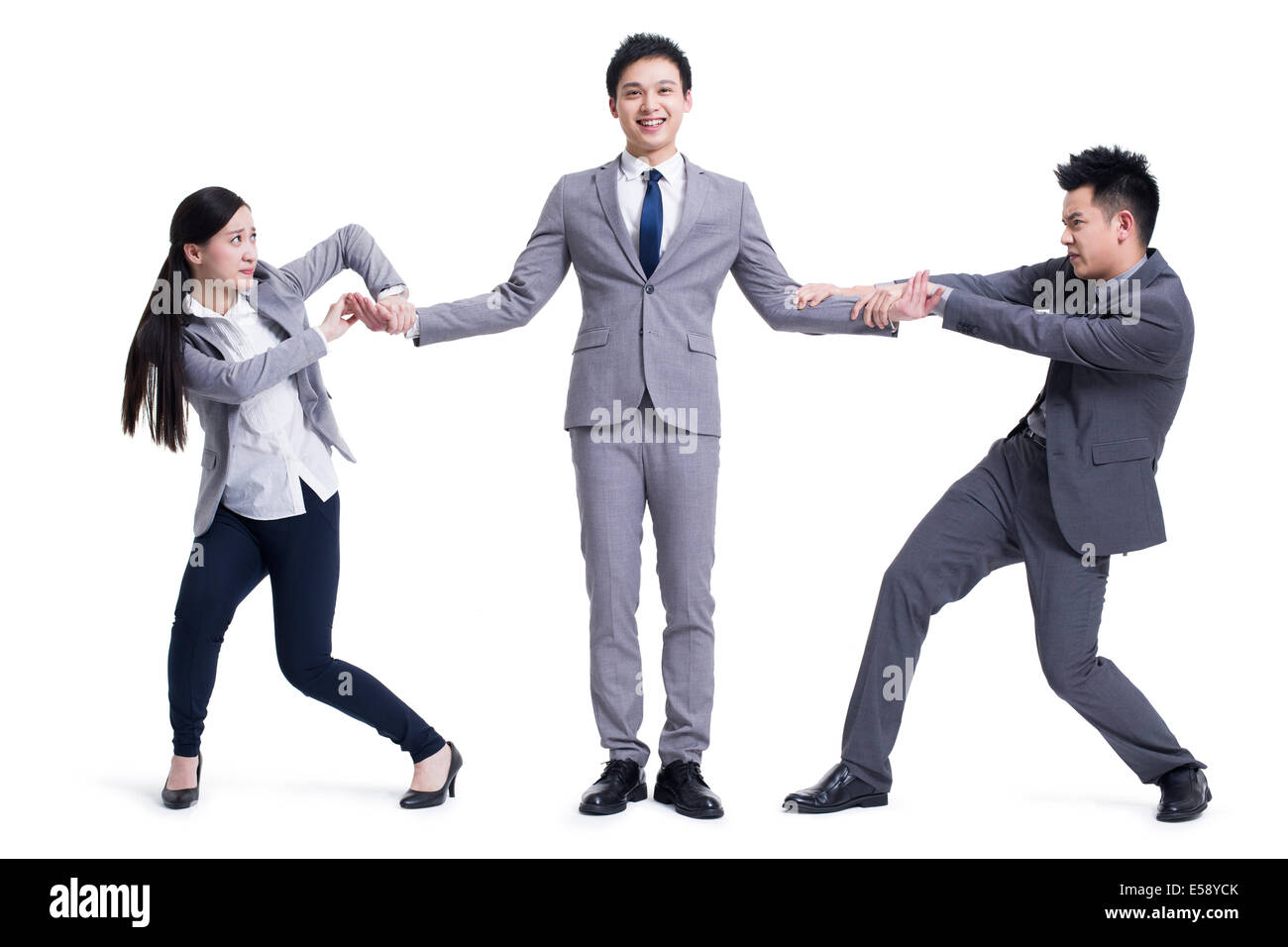 Three business people fighting hi-res stock photography and images - Alamy