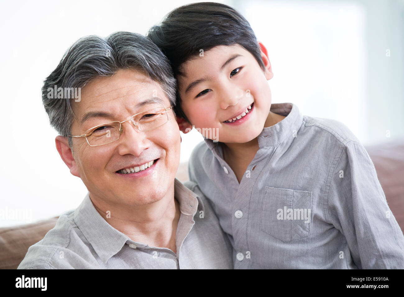 Cute chinese grandson sitting hi-res stock photography and images - Alamy