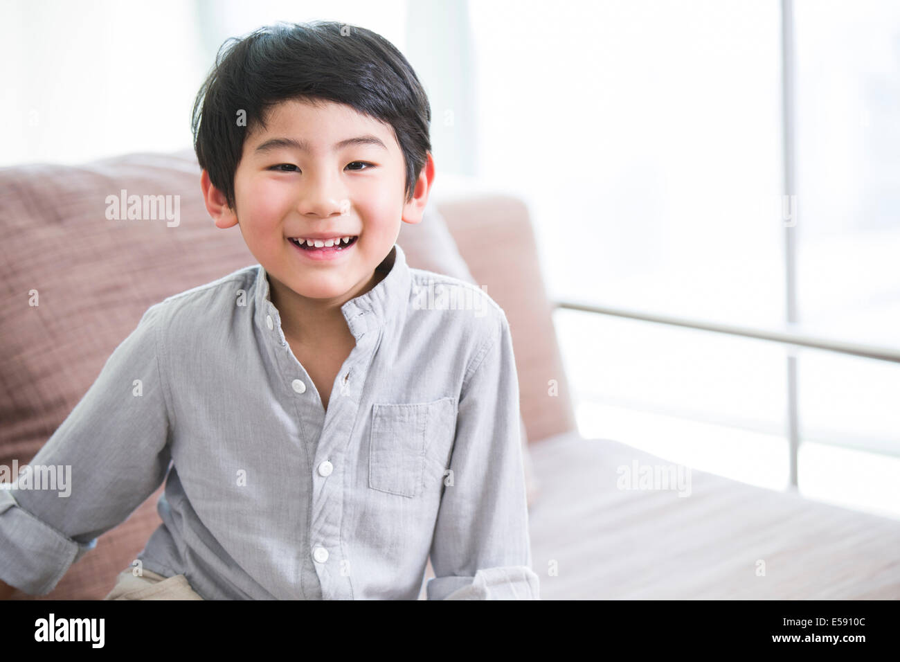 Cute boy smiling Stock Photo - Alamy