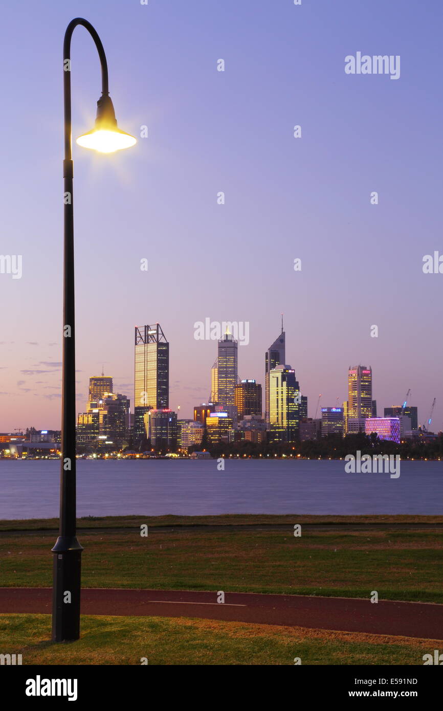 A street light illuminating an exercise track in front of Perth city ...