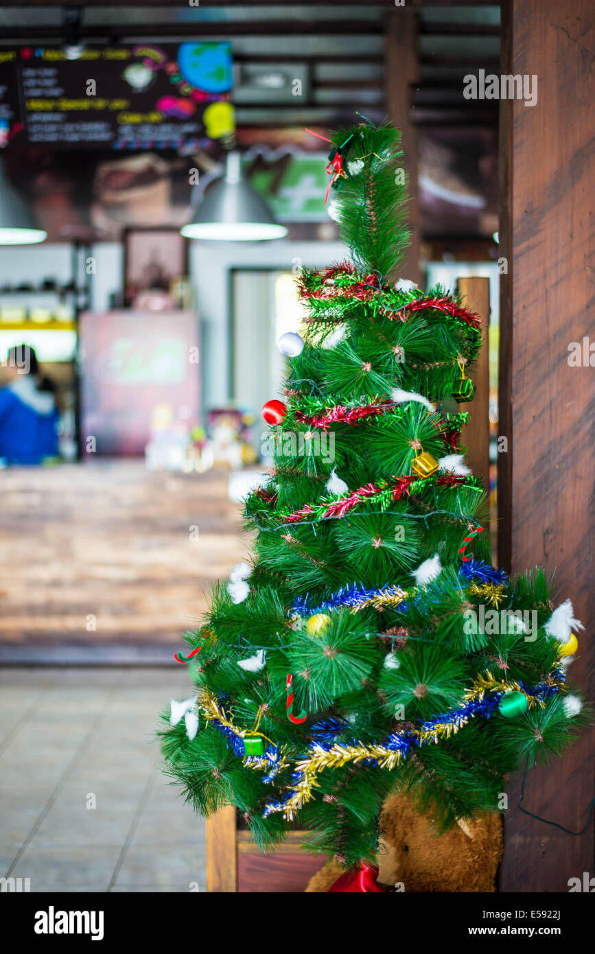 Christmas tree decoration in a coffee café Stock Photo - Alamy