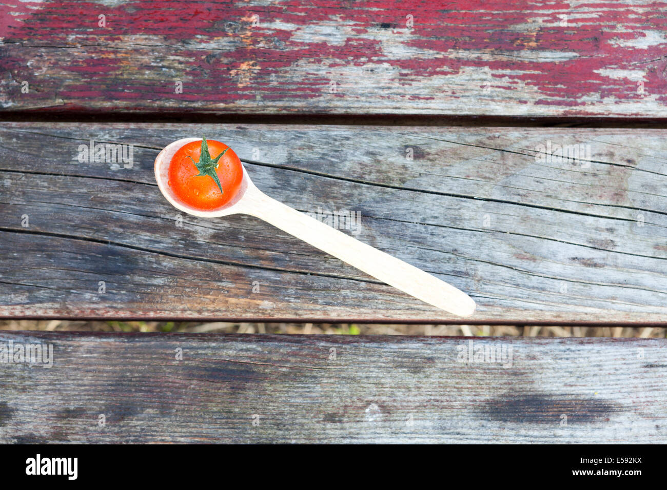 Spoon with tomato hi-res stock photography and images - Alamy