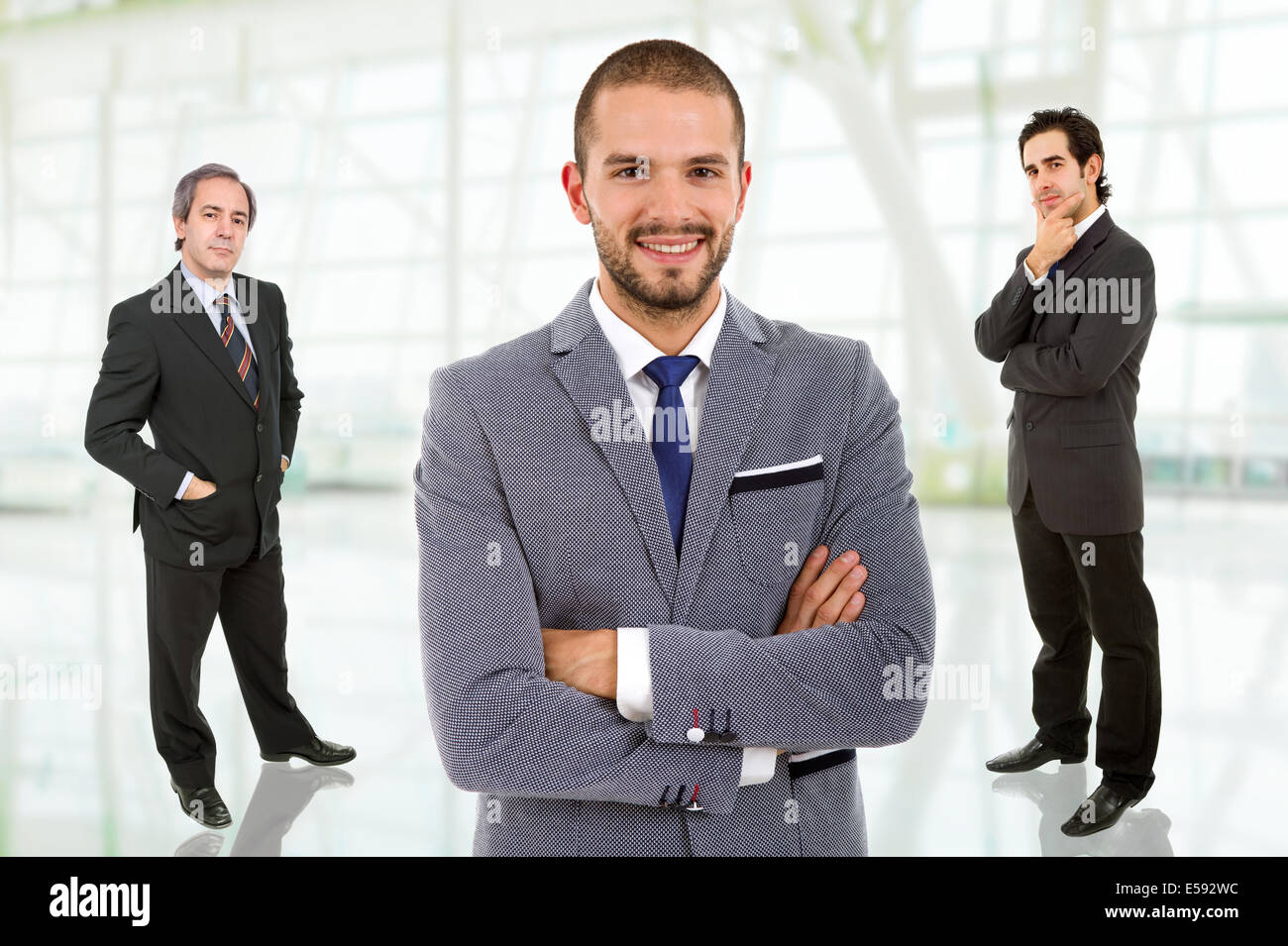 three business men portrait at the office Stock Photo - Alamy
