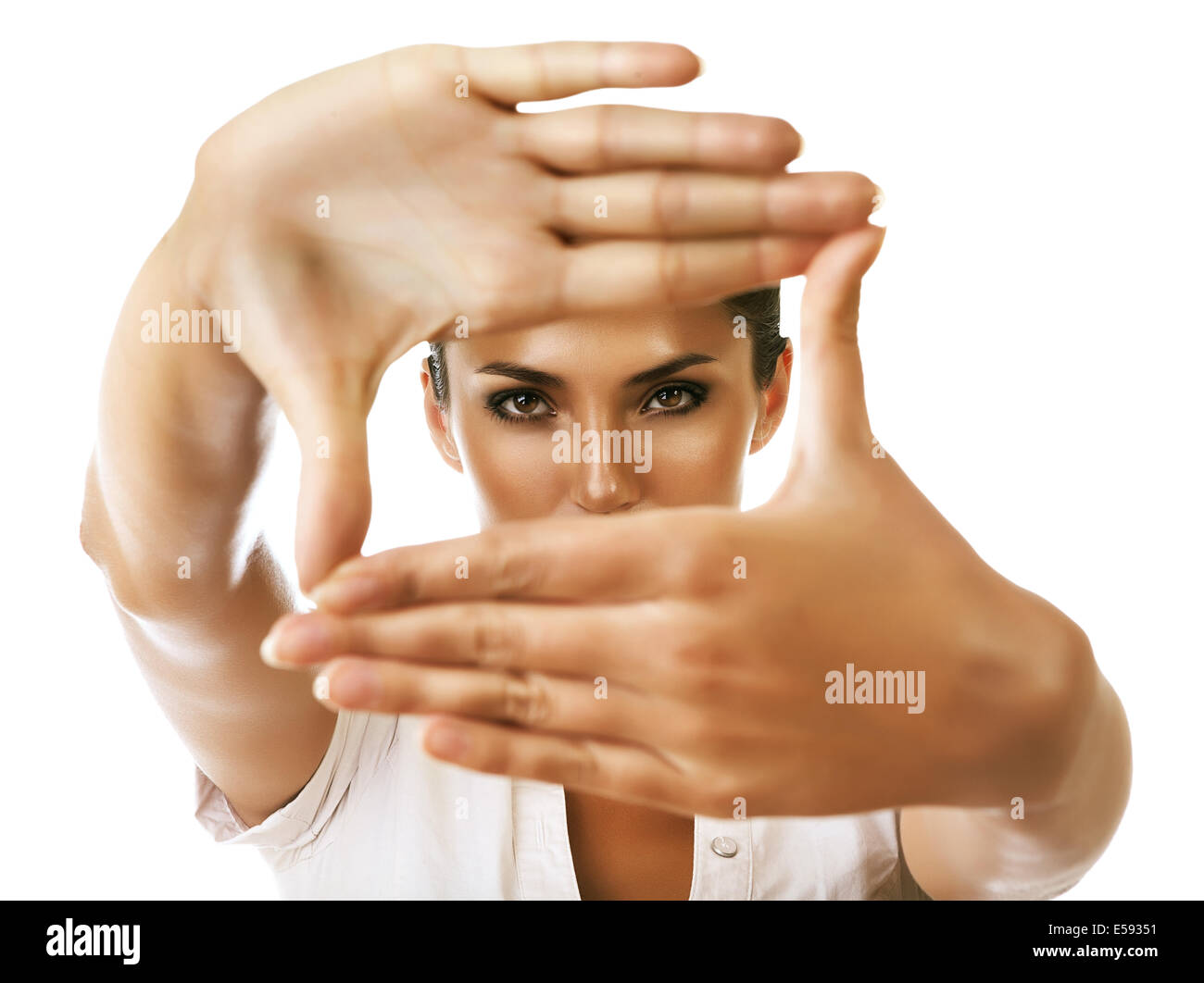 woman showing framing hand gesture on white background Stock Photo - Alamy